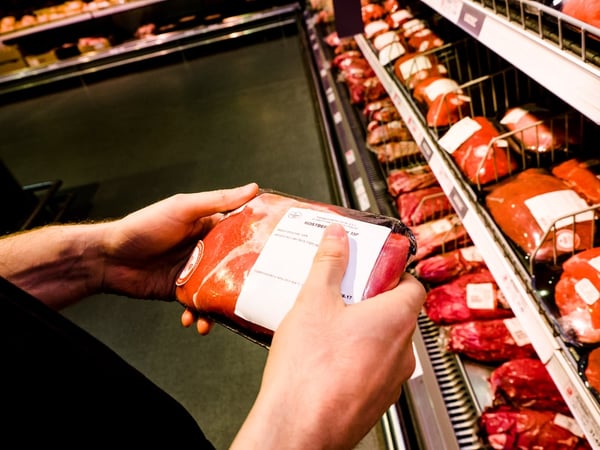 Affixing labels at different temperatures